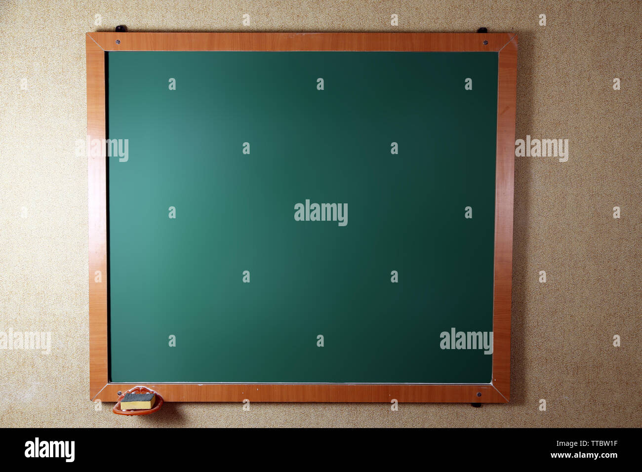 Blackboard on wall, close up Stock Photo - Alamy