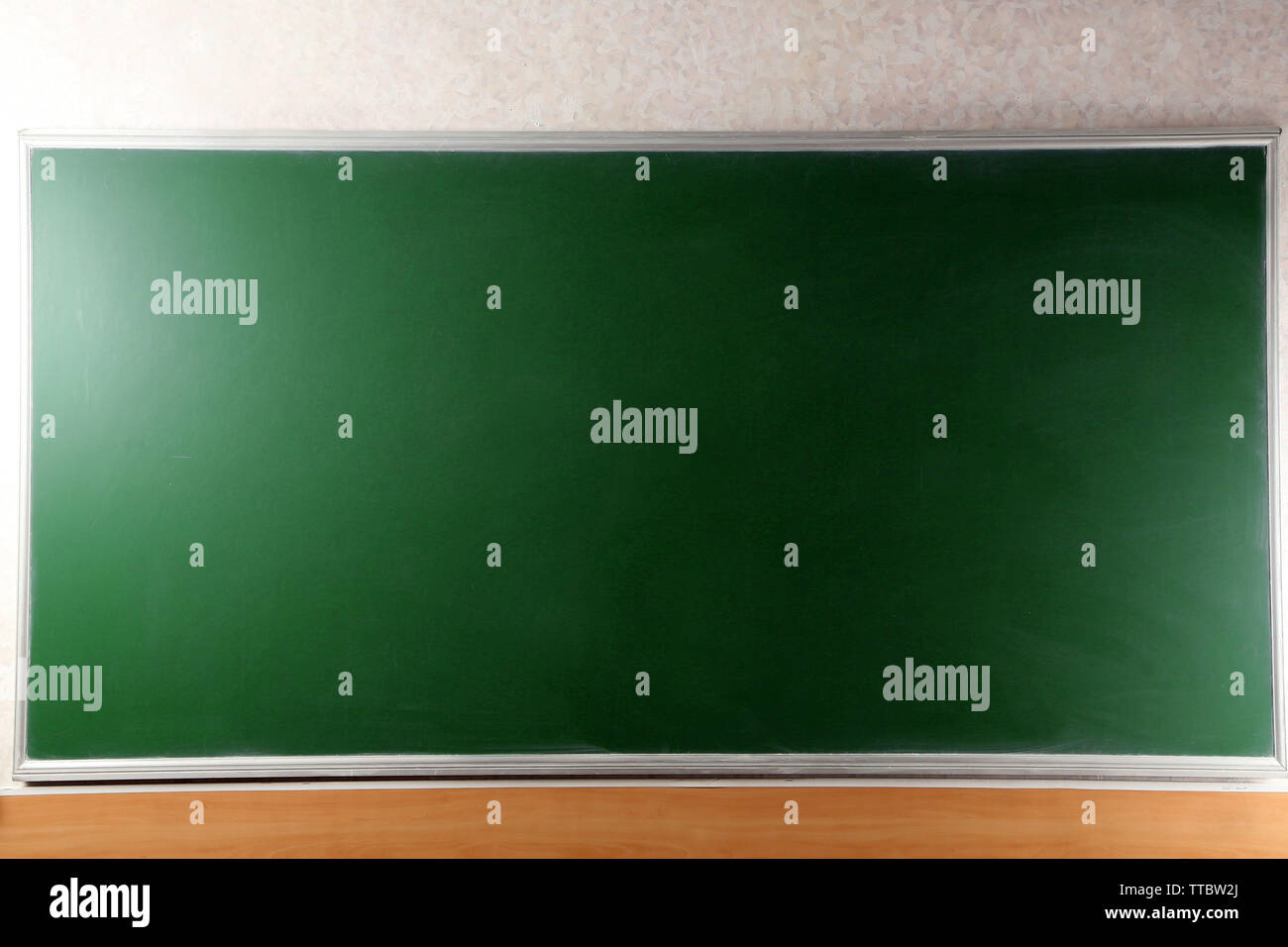 Blackboard on wall, close up Stock Photo - Alamy