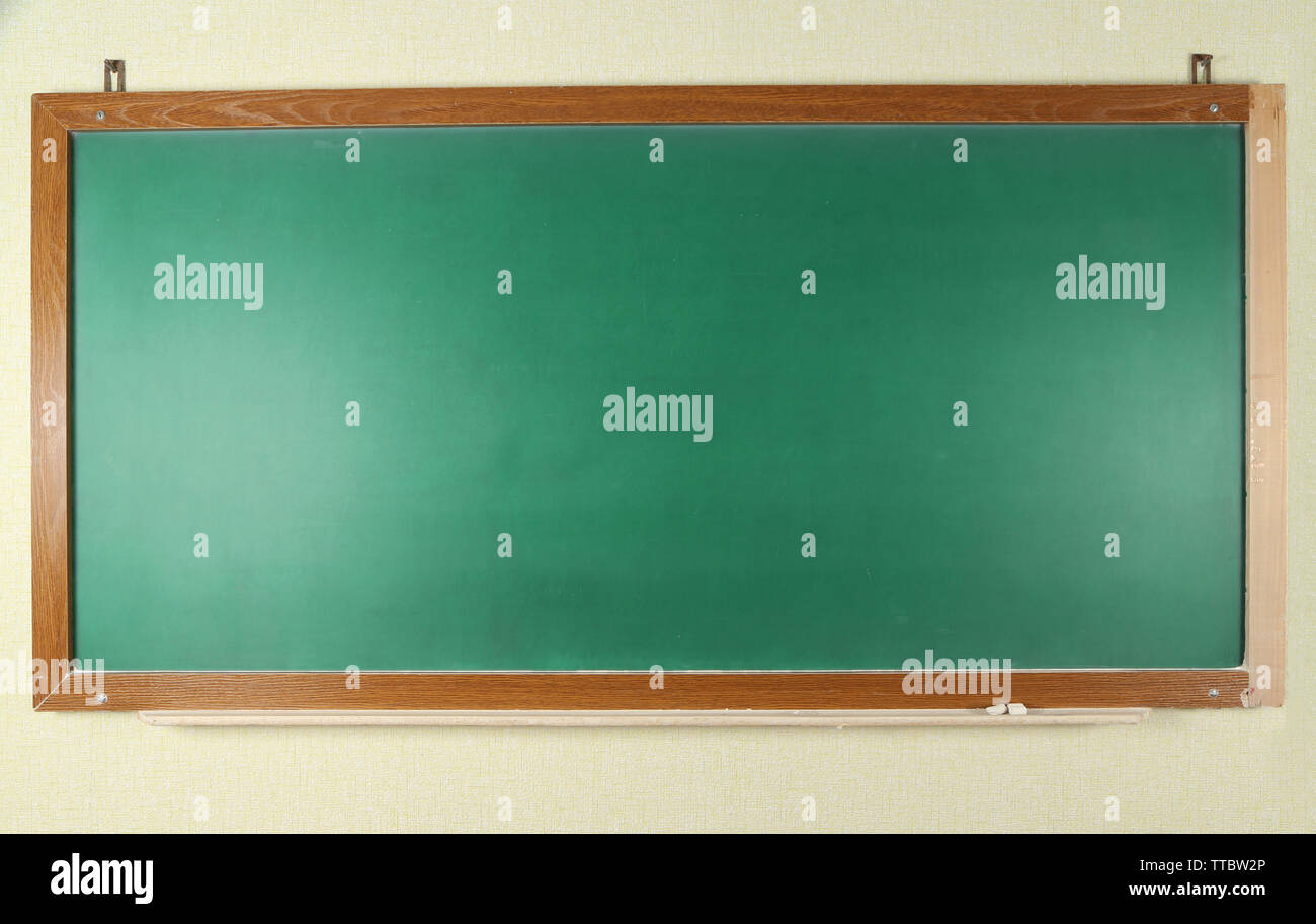 Blackboard on wall, close up Stock Photo - Alamy