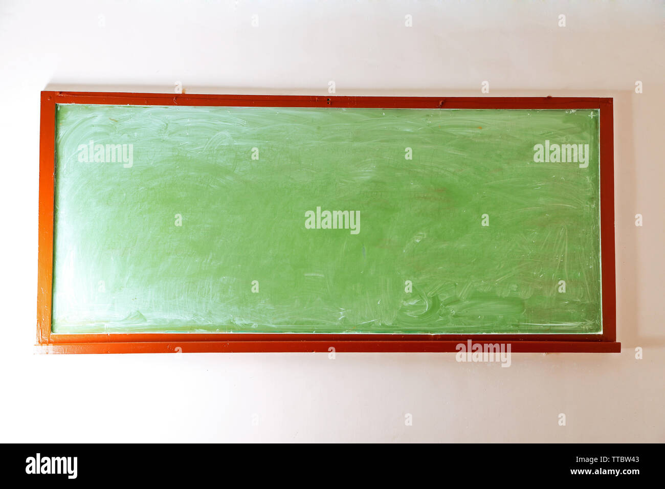 Blackboard on wall, close up Stock Photo - Alamy