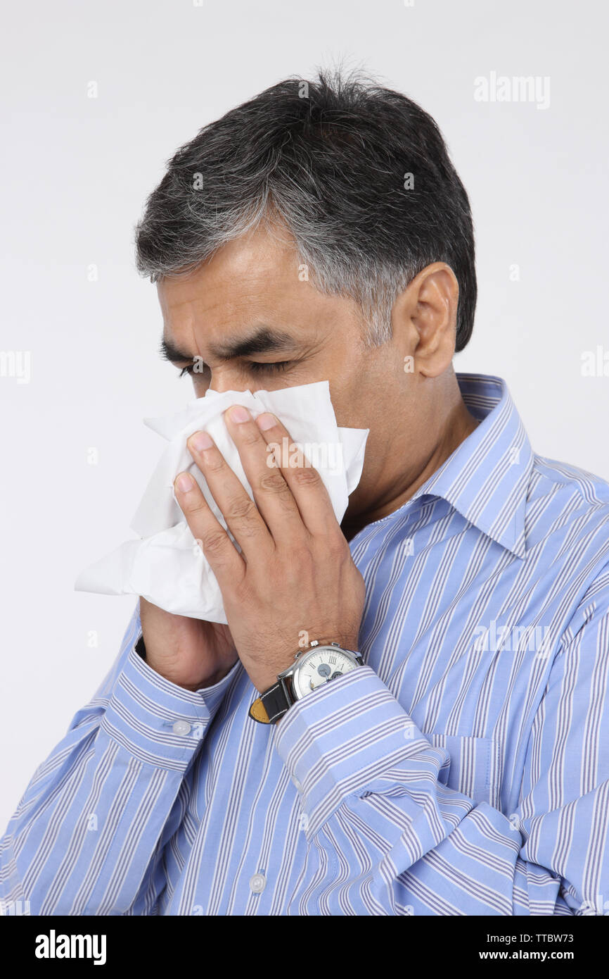 Blowing into hanky hi-res stock photography and images - Alamy