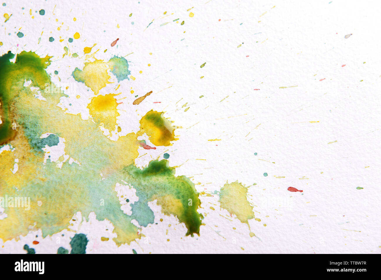 Watercolor stains on white paper background Stock Photo - Alamy