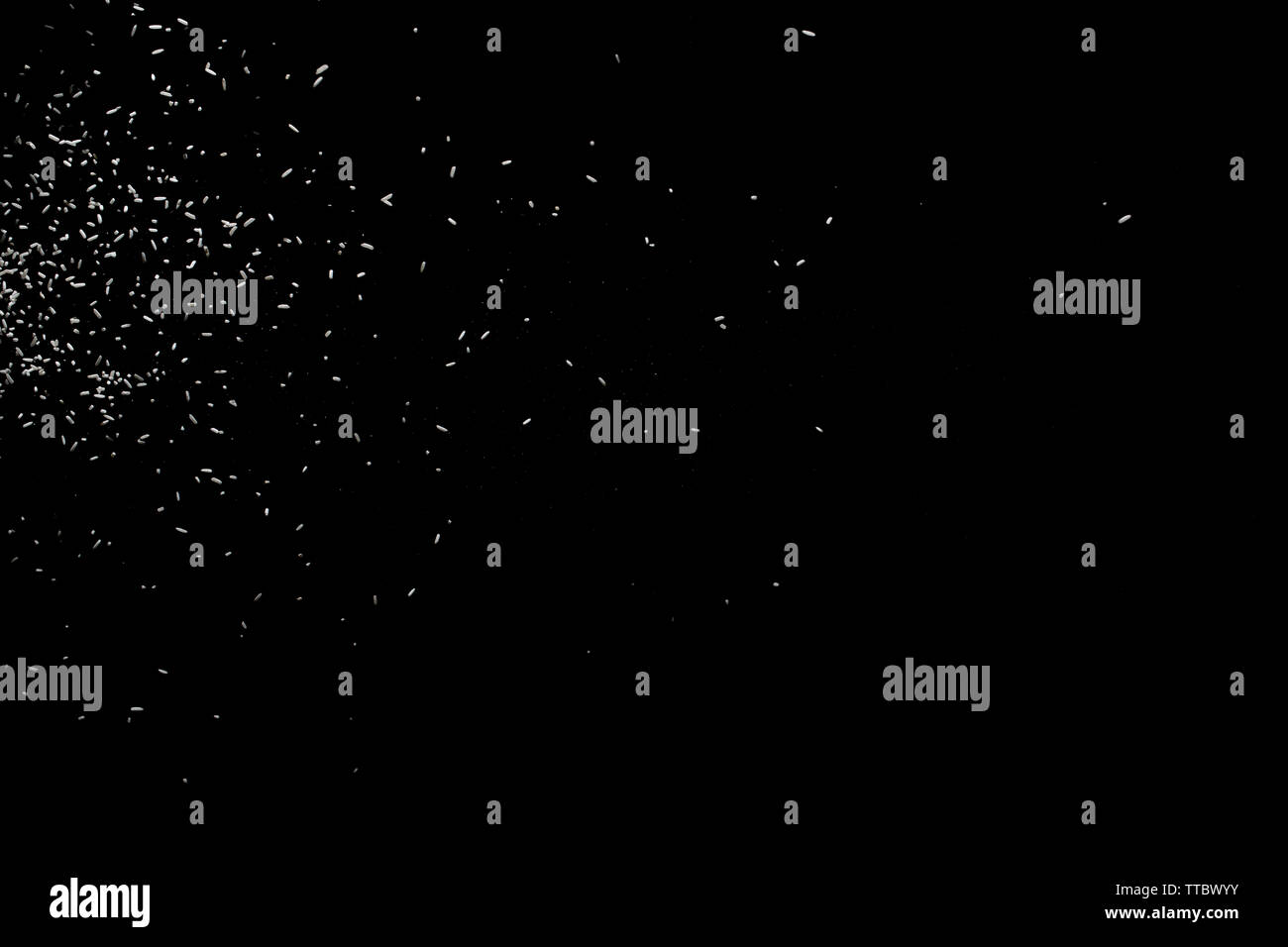 White falling particles round shape on black backround.Glowing blizzard ...