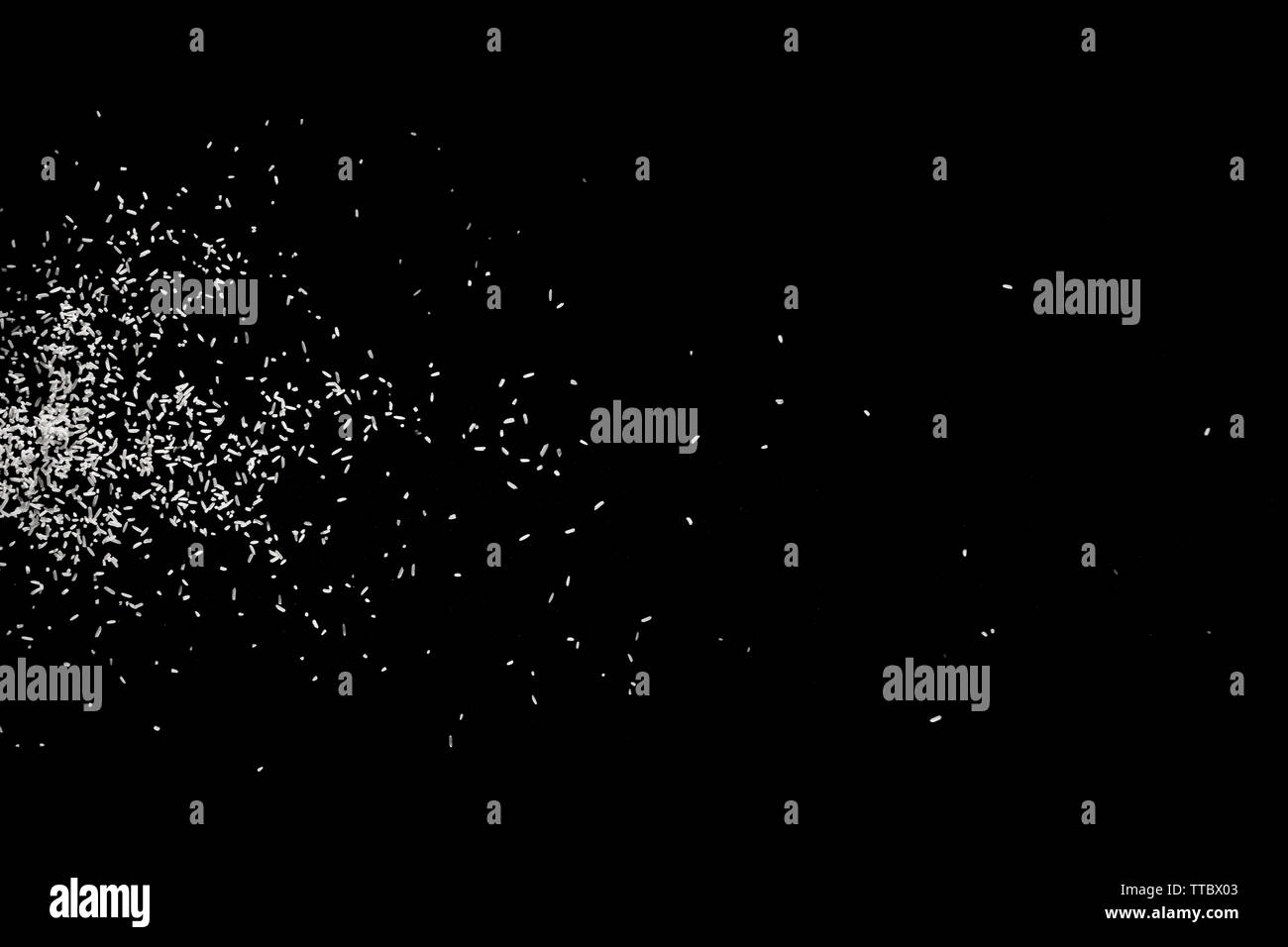 White falling particles round shape on black backround.Glowing blizzard ...
