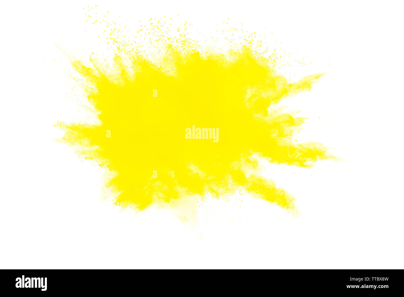 Abstract yellow powder explosion on white background.Freeze motion of ...