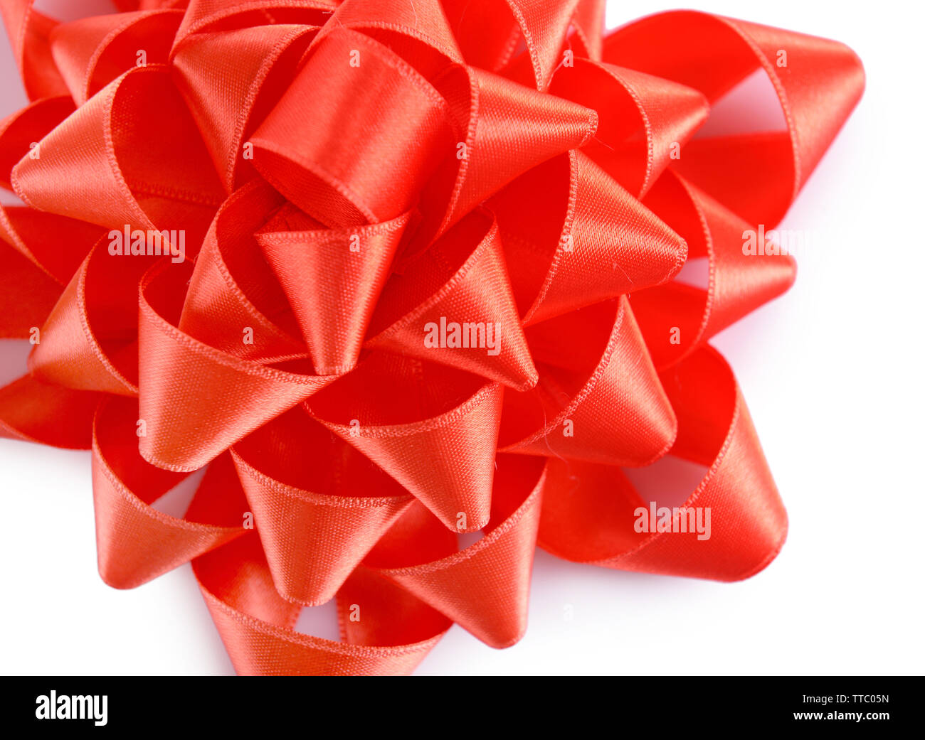 Red bow isolated on white background, close up Stock Photo - Alamy