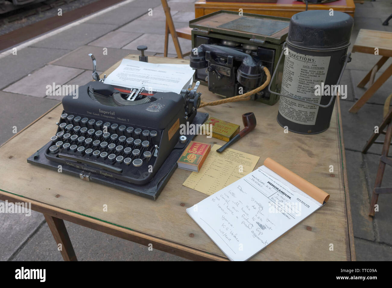 Imperial Model T Typewriter and RAF Field Telephone on a Desk Stock ...