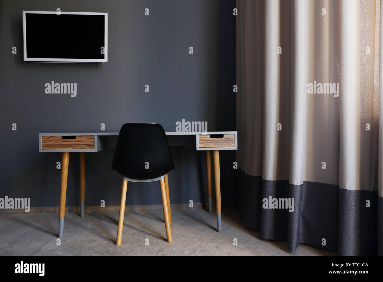 Modern interior - television, chair, table Stock Photo - Alamy