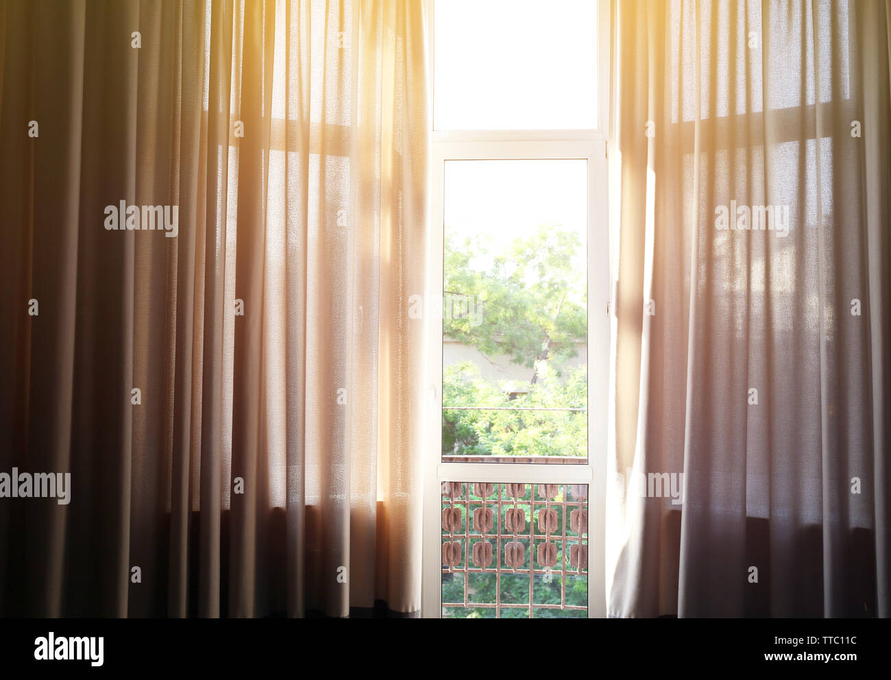Opened window with beautiful curtains Stock Photo - Alamy