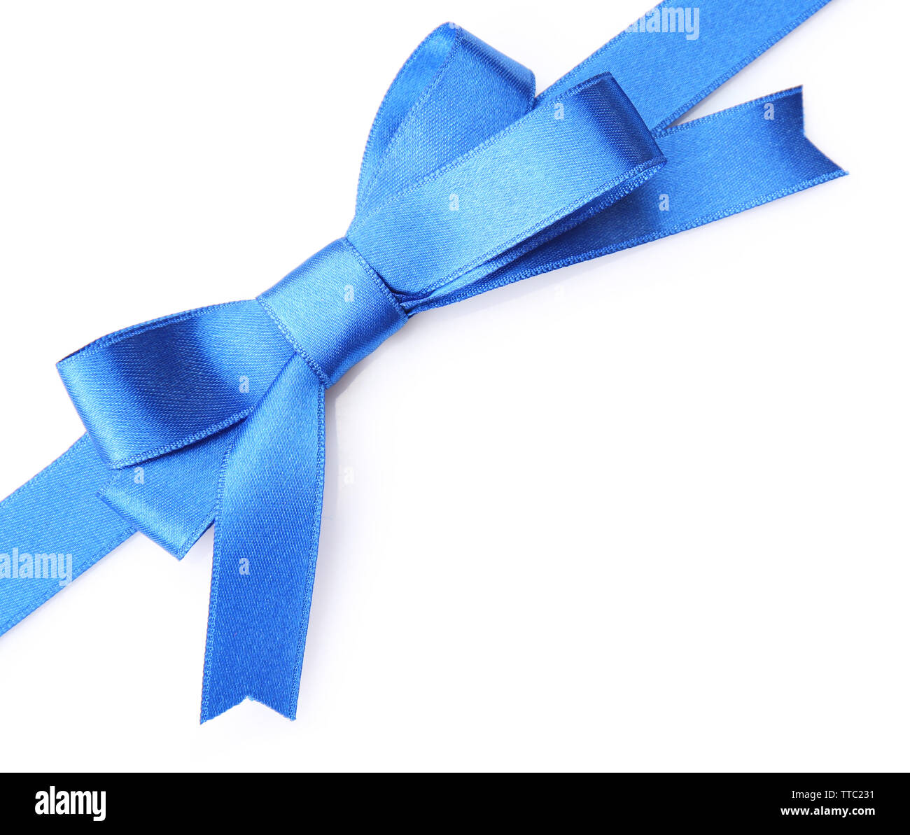 Dark blue ribbon bow isolated on white Stock Photo - Alamy