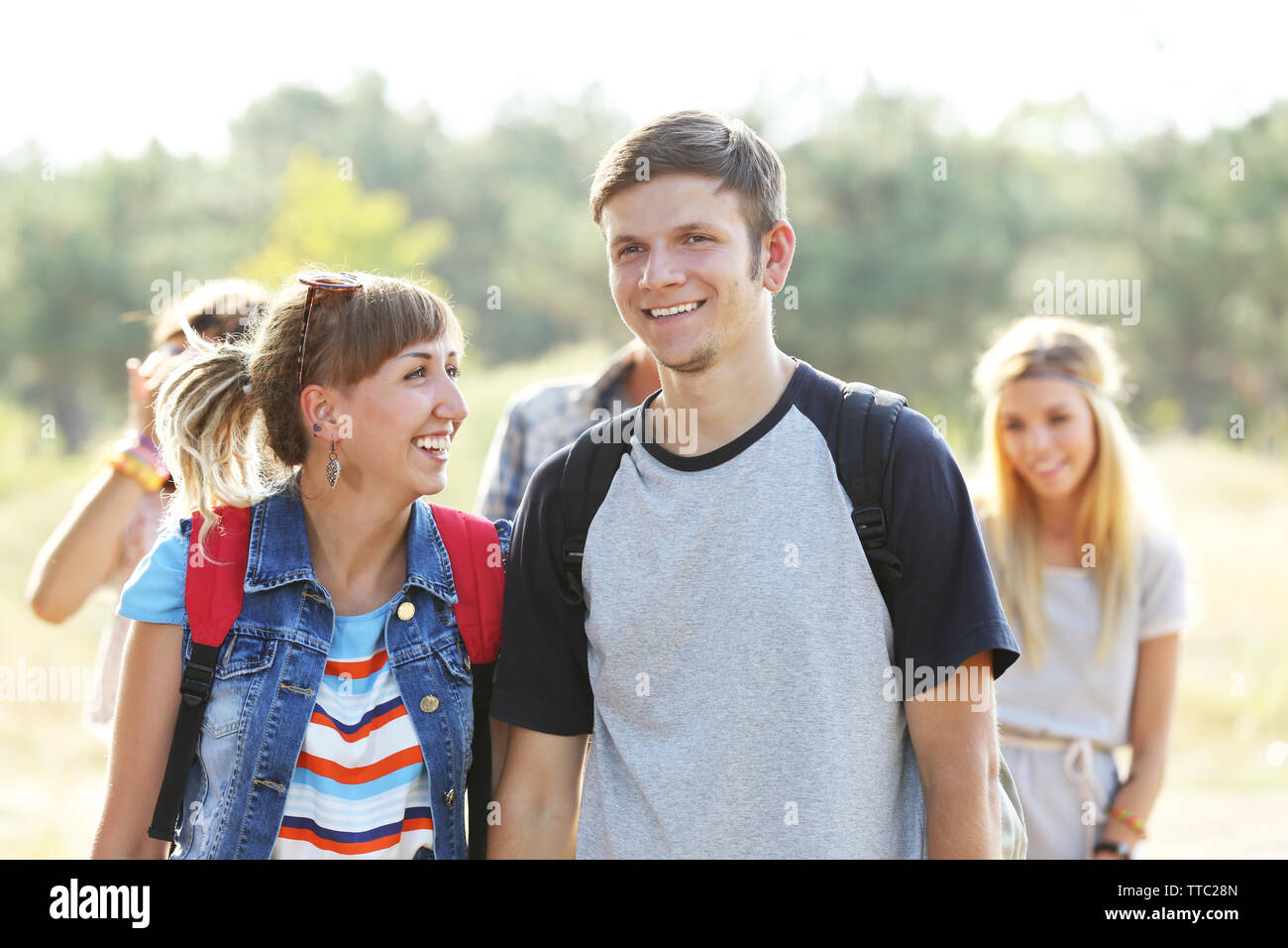A group of joyful friends having fun outdoors Stock Photo - Alamy