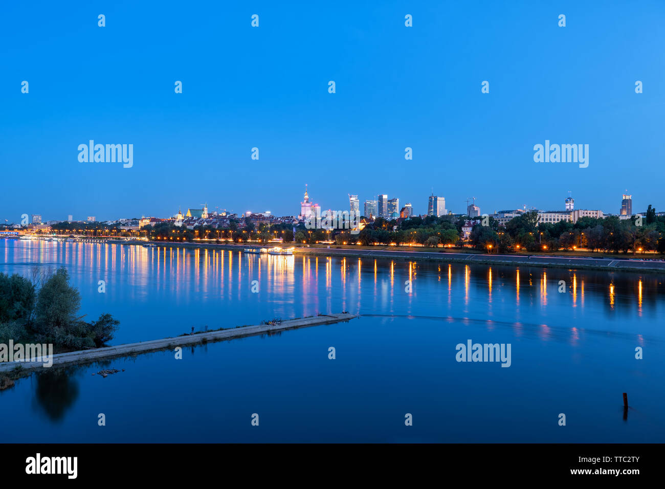 City skyline of Warsaw in the evening, view across the Vistula River ...