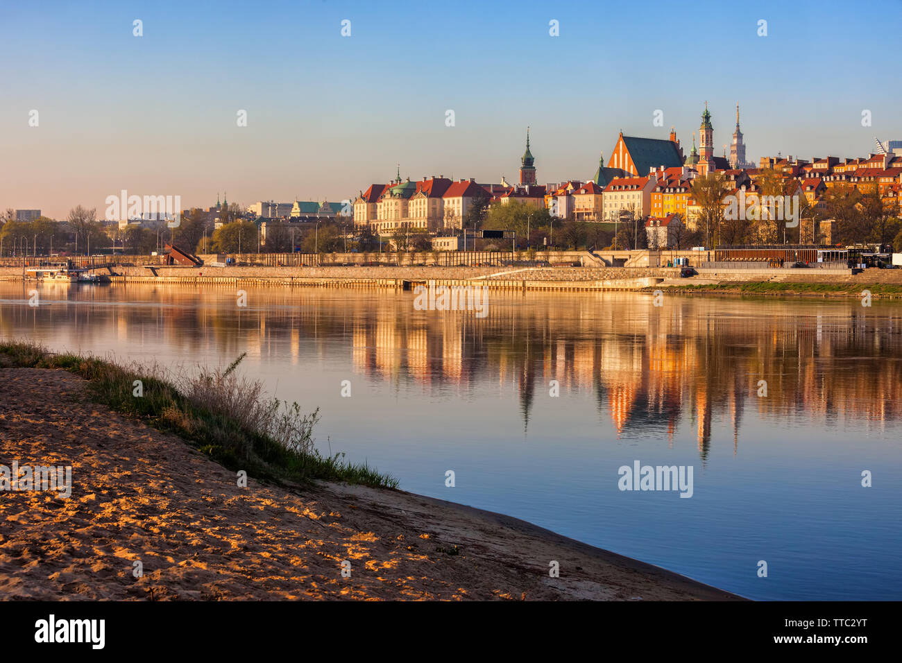 City of Warsaw at sunrise in Poland, beach by the Vistula River and Old ...