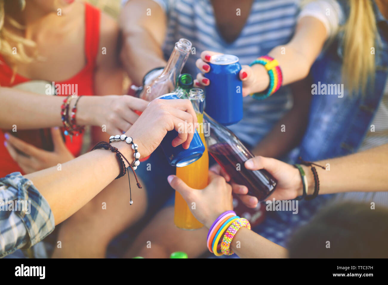 Happy friends cheers, outdoors Stock Photo - Alamy