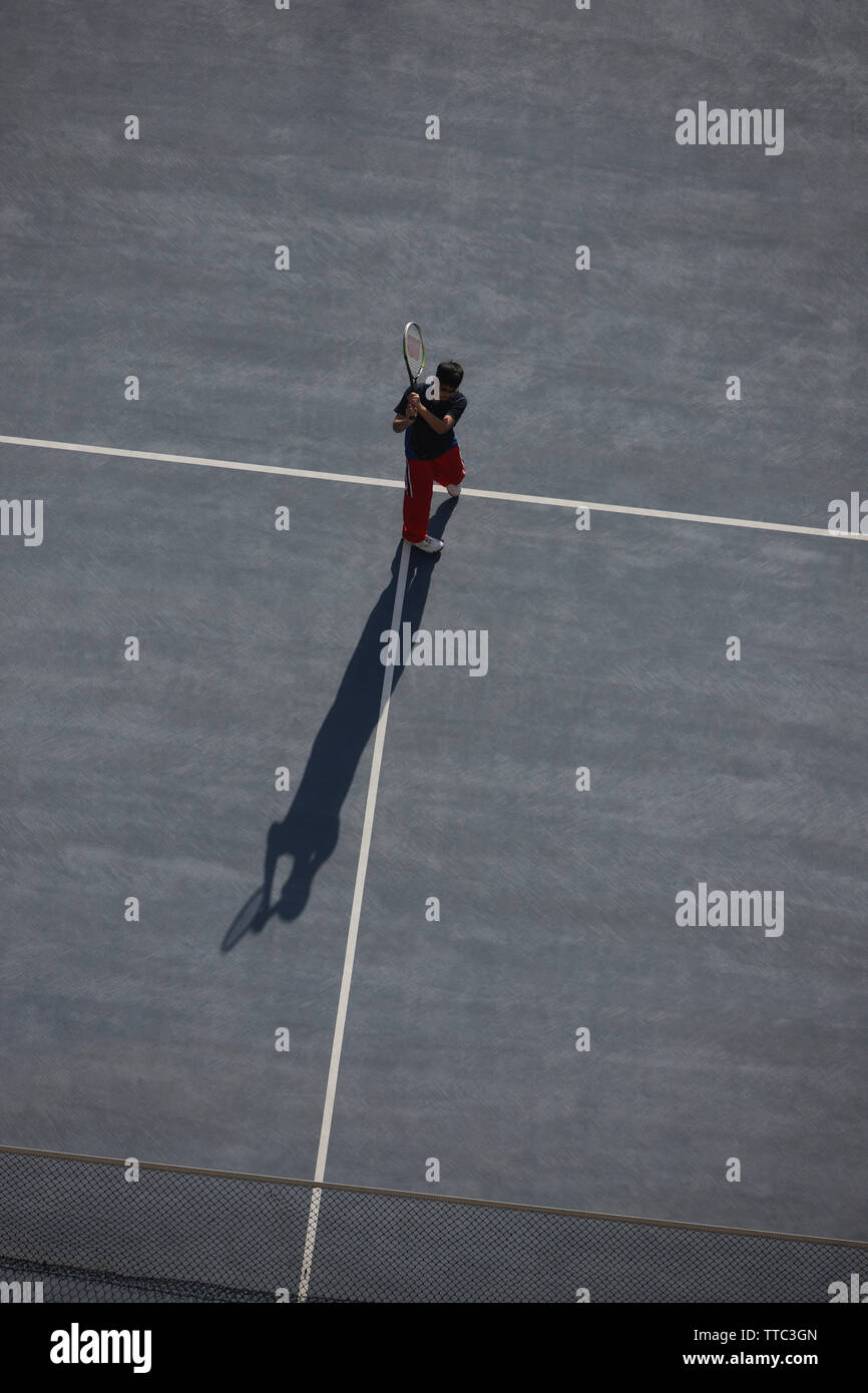 High angle view of a man playing tennis Stock Photo - Alamy