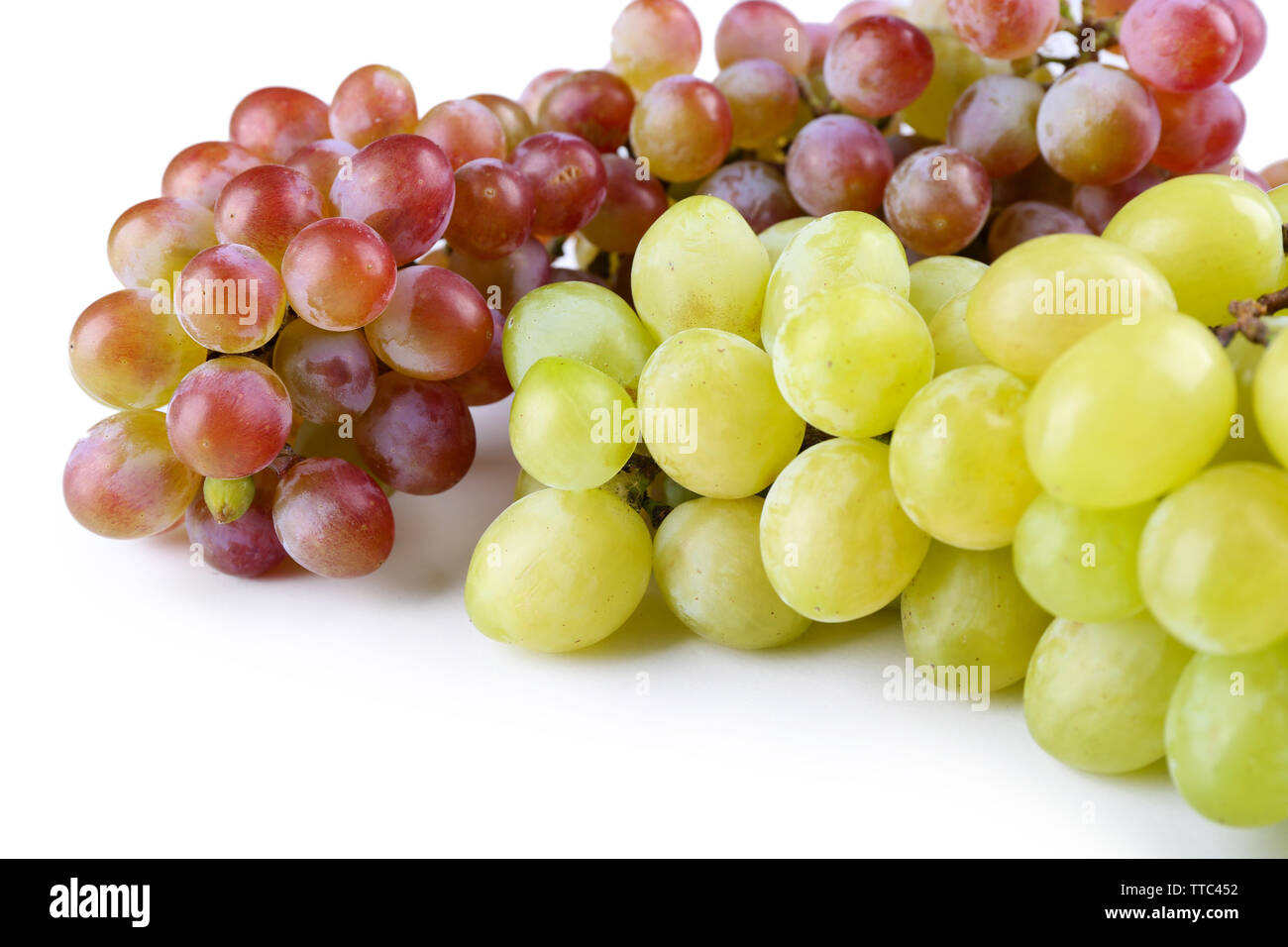 Branches of red of white grape isolated on white background, close up ...