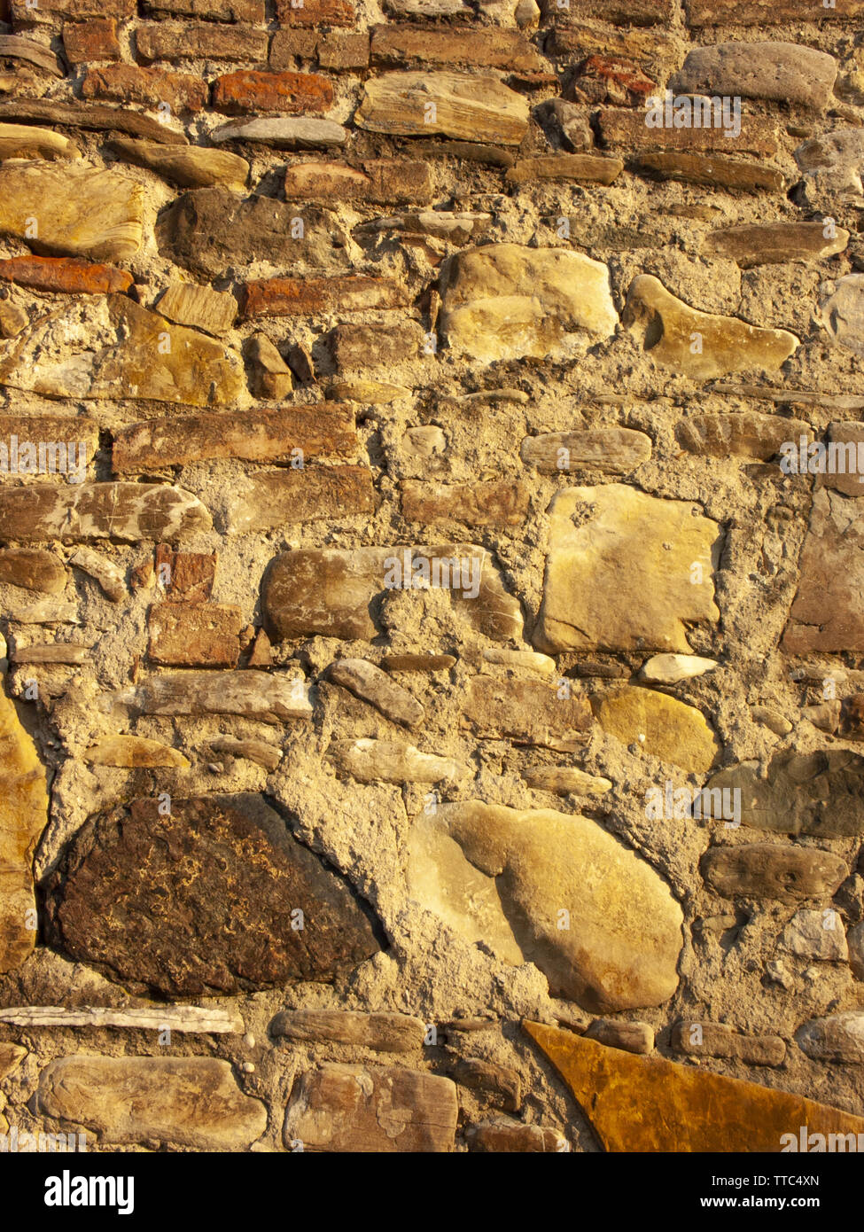 Typical detail of an ancient wall of an Italian house in Rimini, on the ...
