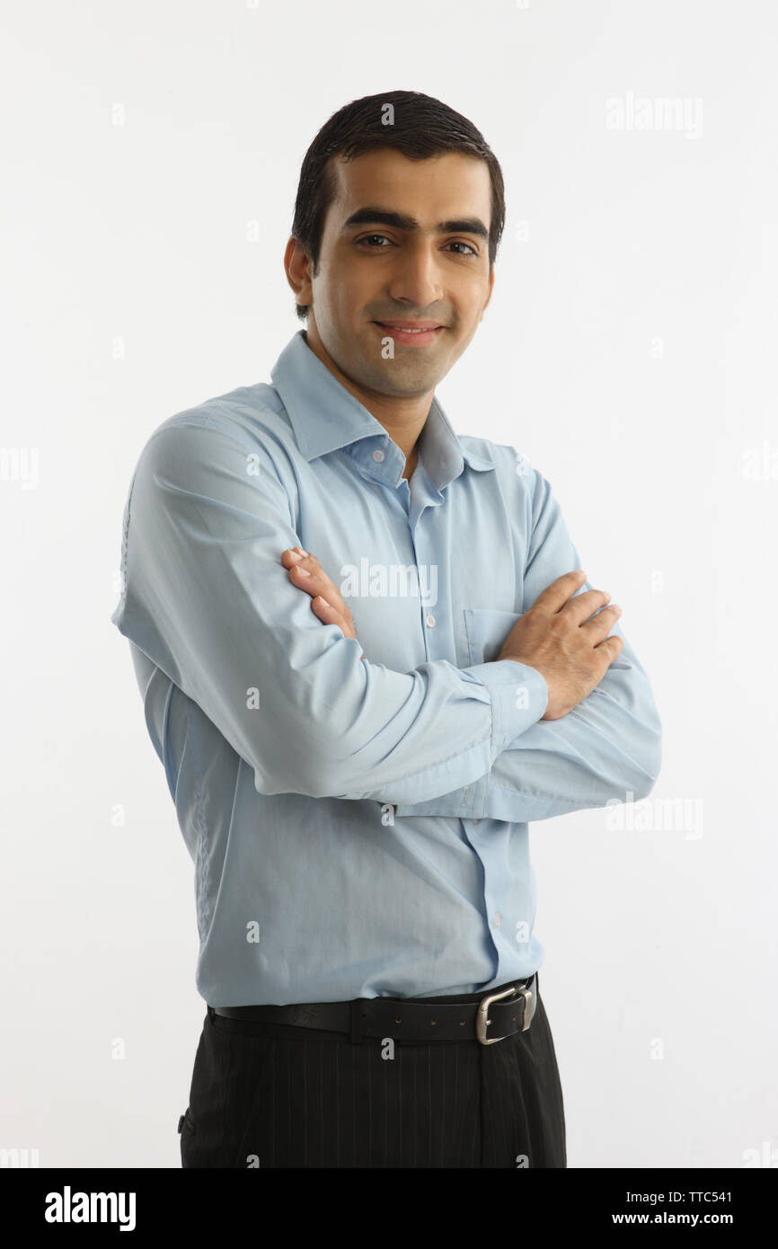 Portrait of a man with arms crossed Stock Photo - Alamy