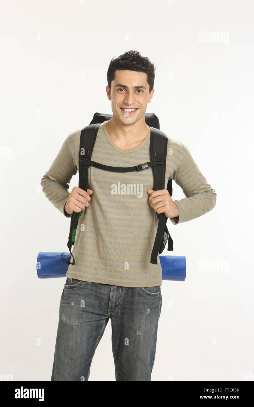 Man hiking wearing backpack Stock Photo - Alamy