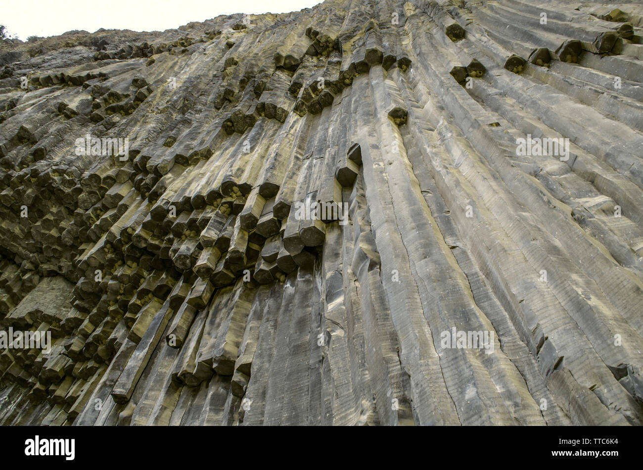 Bottom view of beautiful, nature-created hanging hexagonal basalt ...