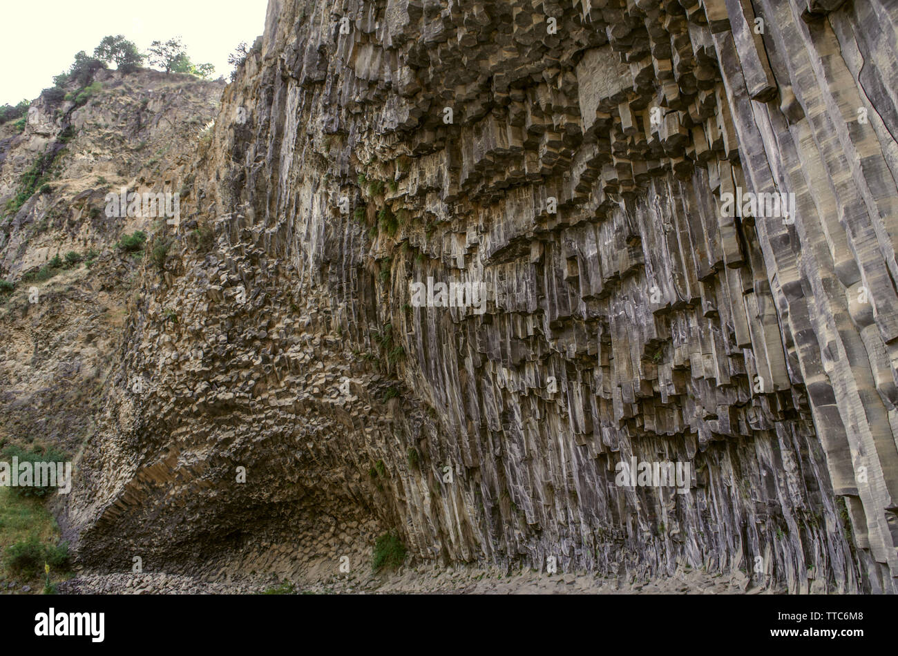 Majestic view created by nature hanging rows of basalt columns on rocks ...