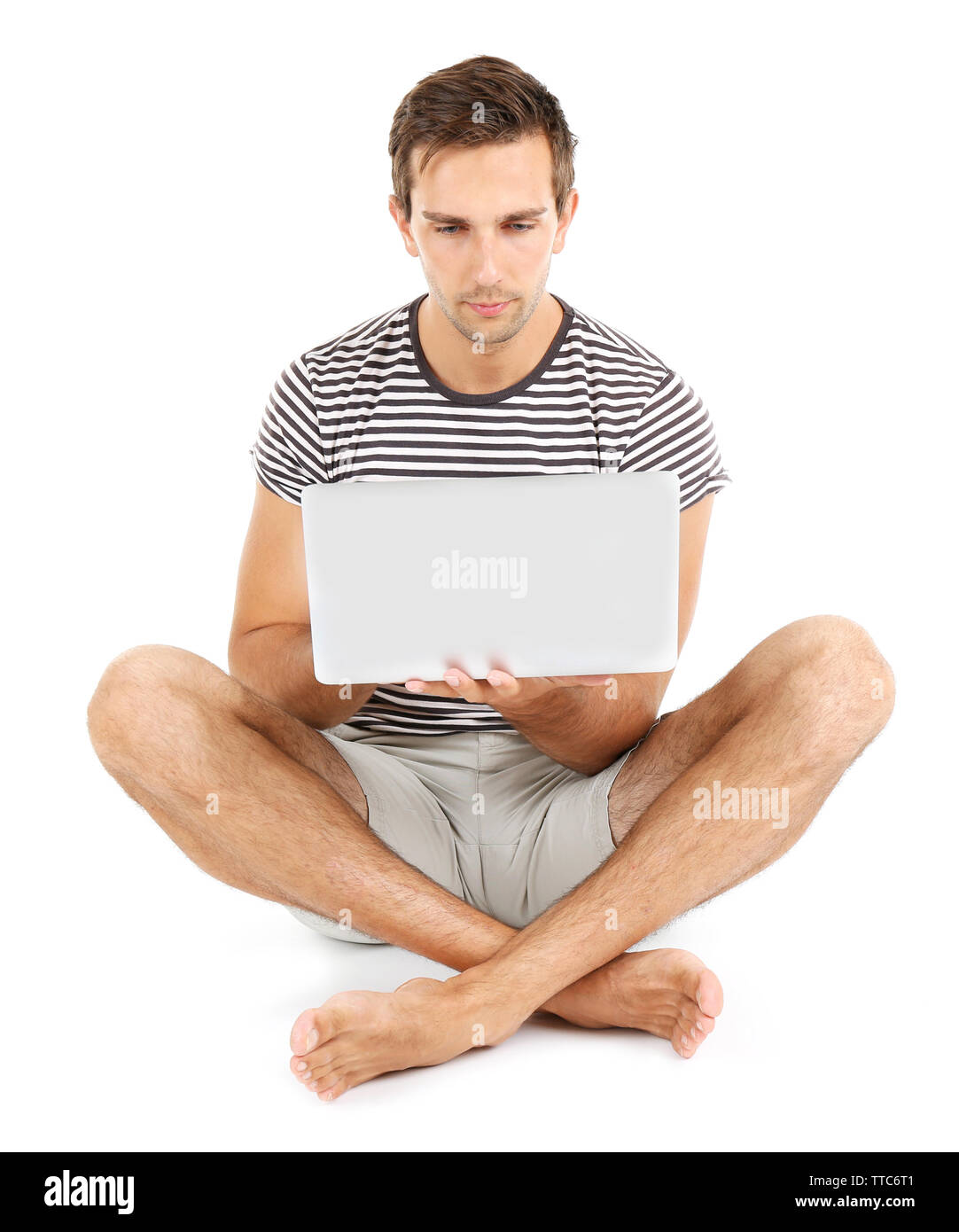 Man with laptop isolated on white background Stock Photo - Alamy