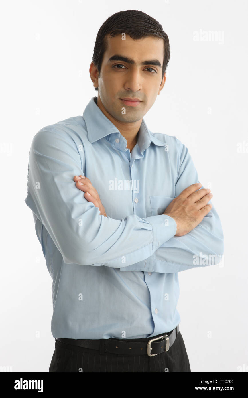 Portrait of a man with arms crossed Stock Photo - Alamy