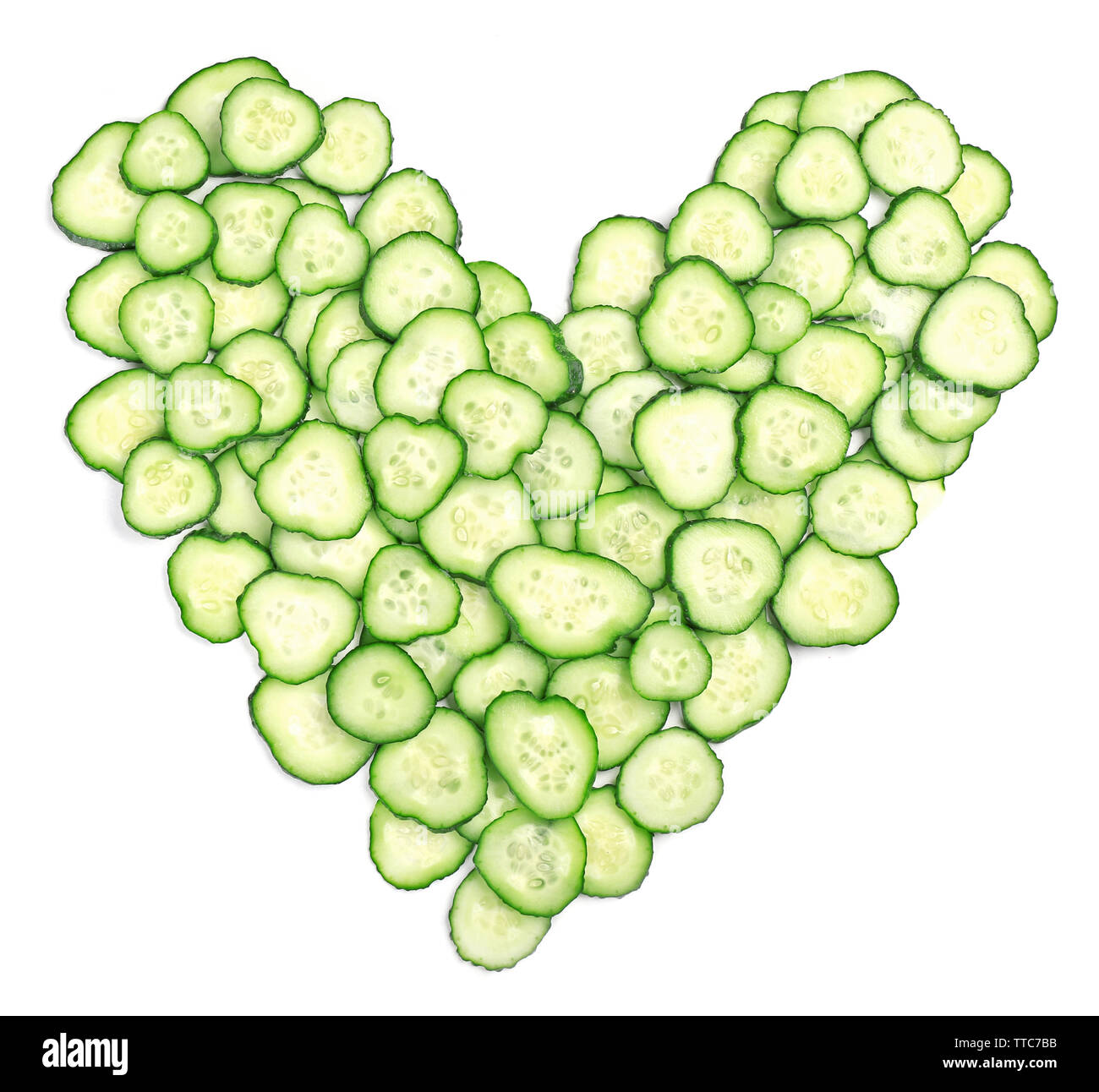 Sliced cucumbers in heart shape isolated on white Stock Photo - Alamy