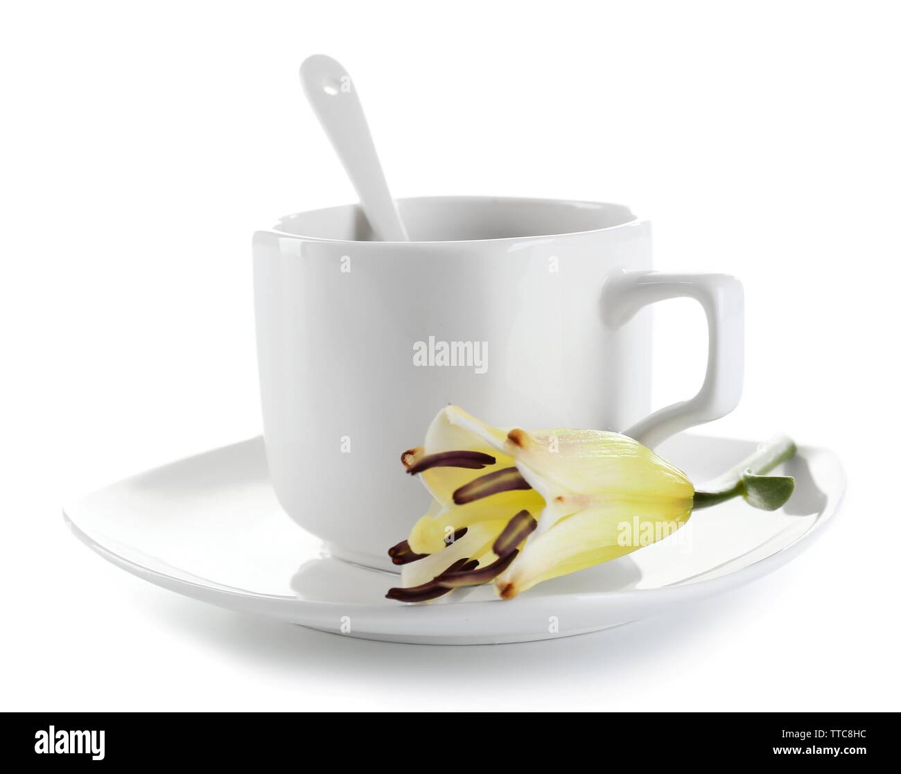 Cup of coffee and lily isolated on white Stock Photo - Alamy