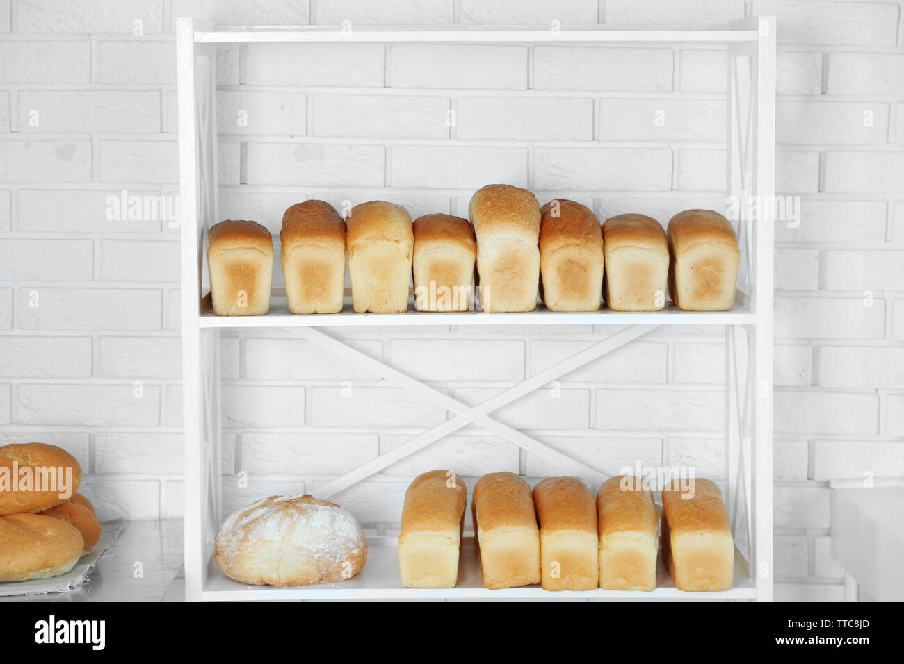 Bread on shelves in store Stock Photo - Alamy