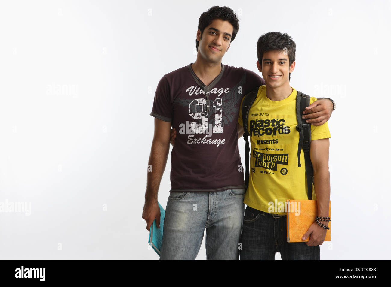 Portrait of two college students smiling Stock Photo - Alamy