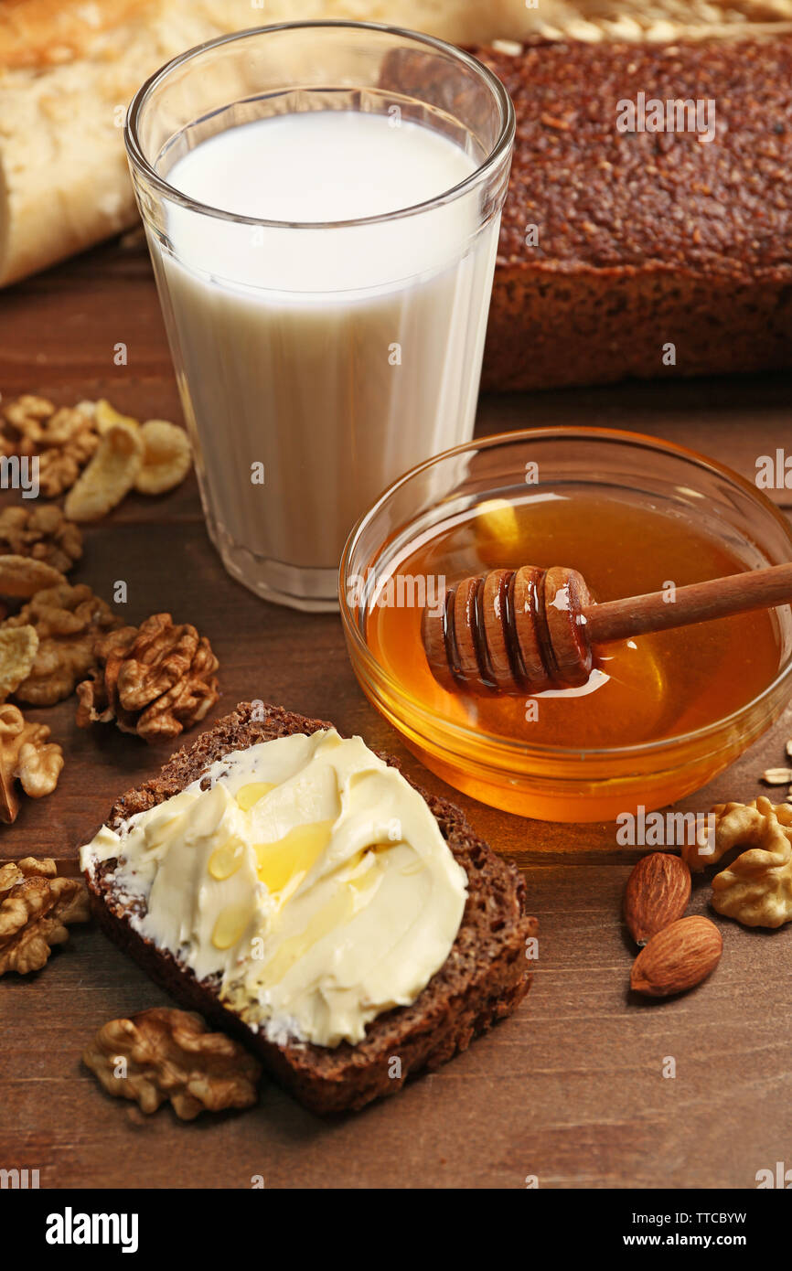 Healthy breakfast with bread, honey, nuts. Country breakfast concept ...