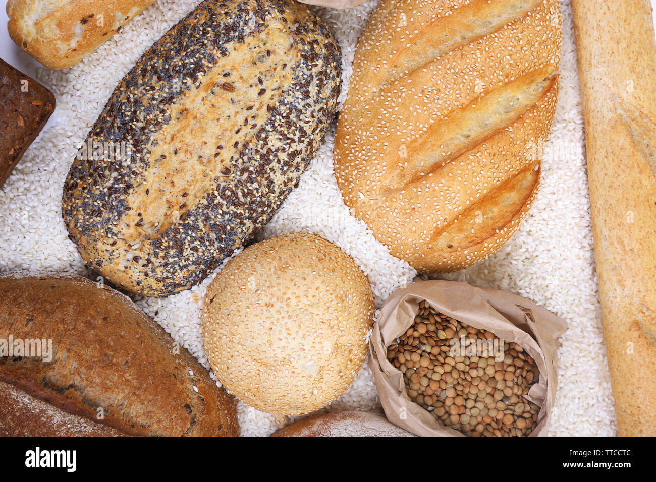 Mixed breads and grains background, close up Stock Photo - Alamy