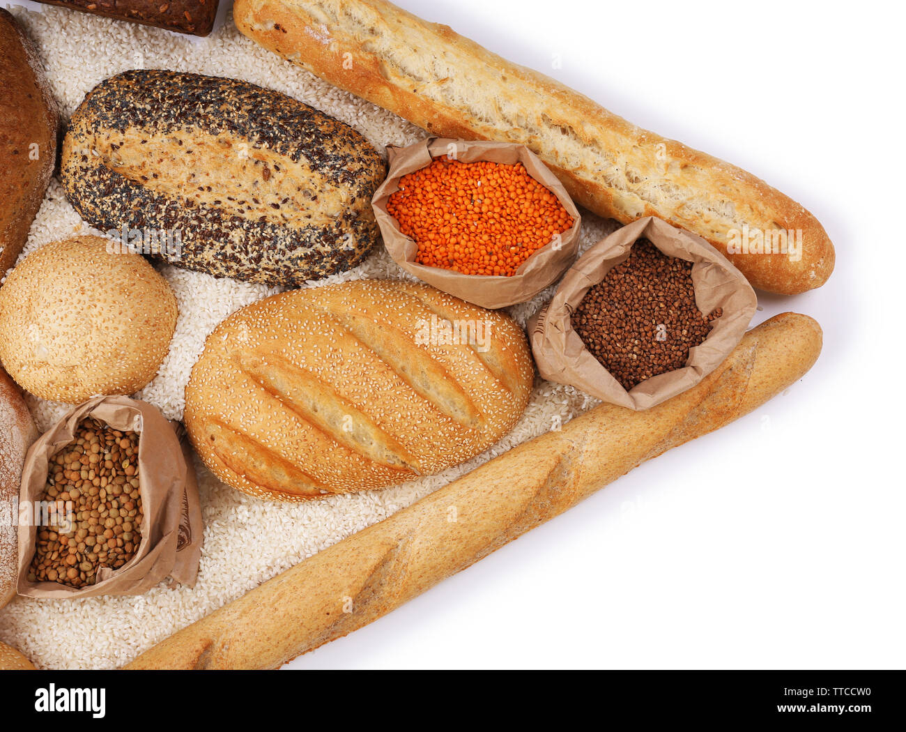 Composition of mixed breads and grains on white background Stock Photo ...