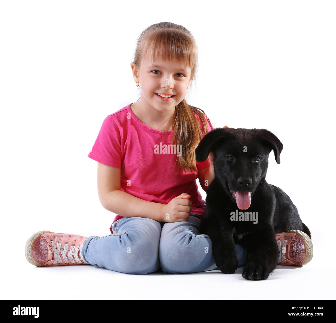 Little cute girl with puppy isolated on white Stock Photo - Alamy