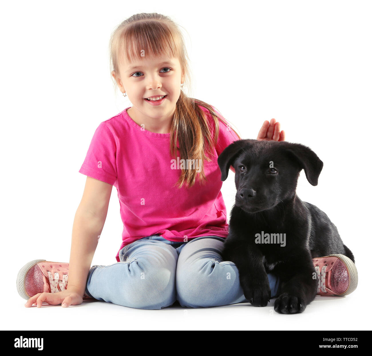 Little cute girl with puppy isolated on white Stock Photo - Alamy