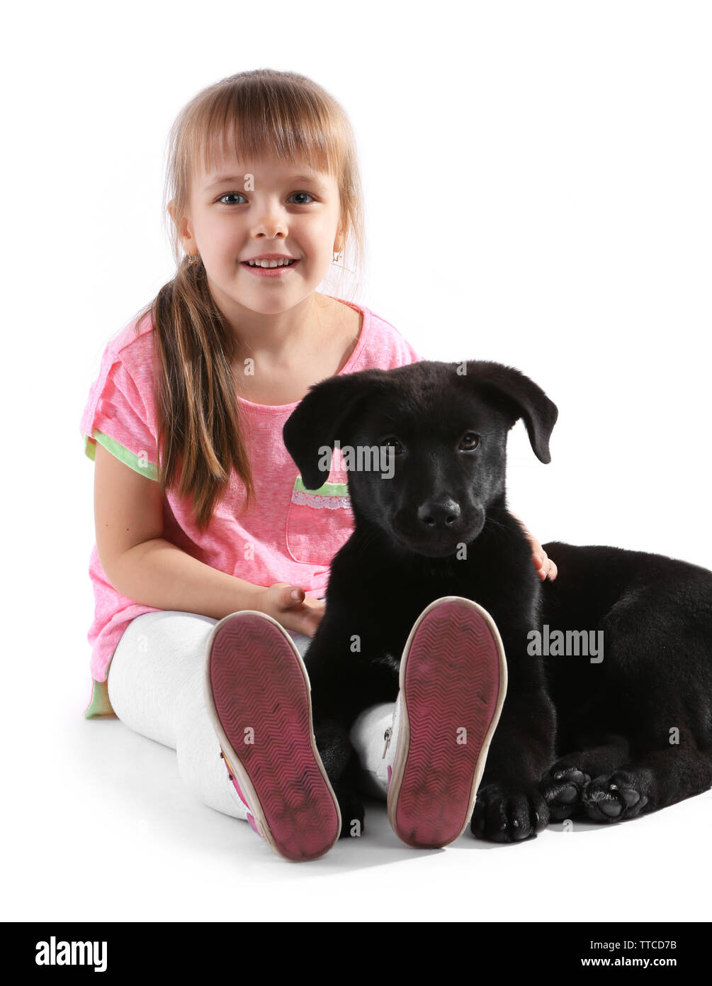 Little cute girl with puppy isolated on white Stock Photo - Alamy