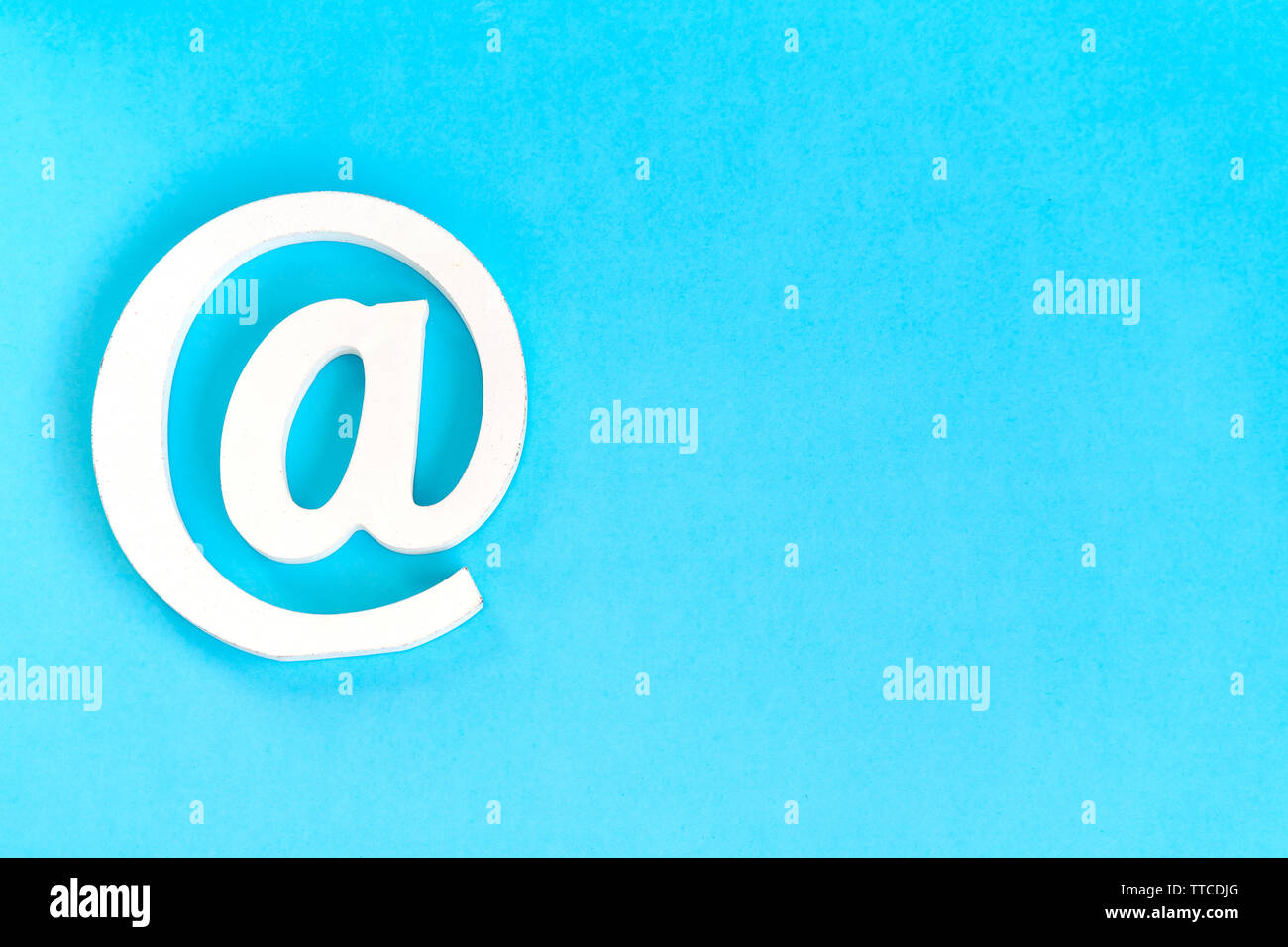 Email sign on blue background. Concept for email, communication or ...