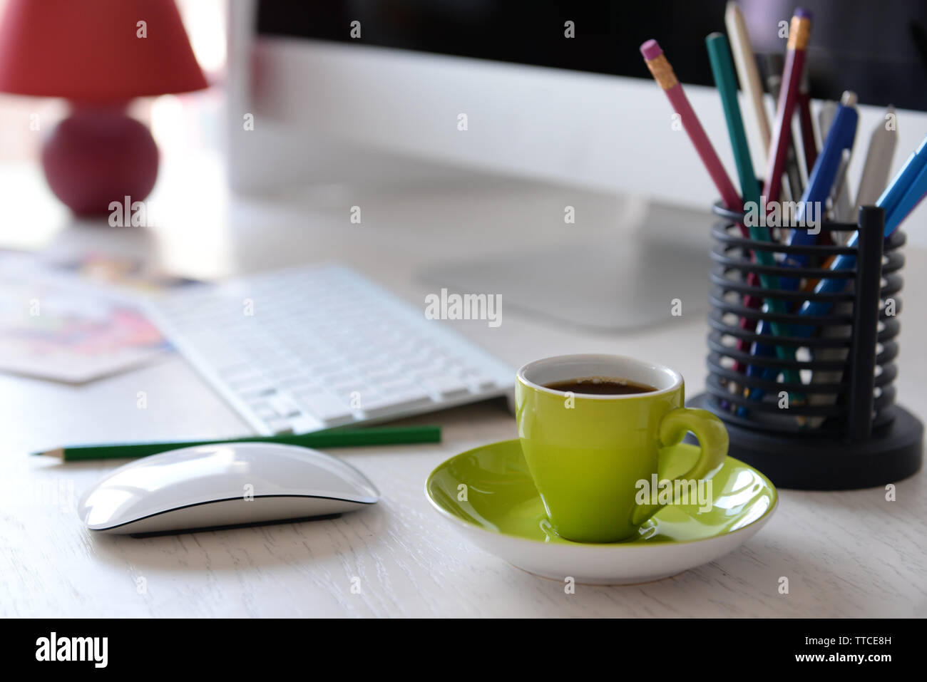 Modern computer on the table in decorated room Stock Photo - Alamy