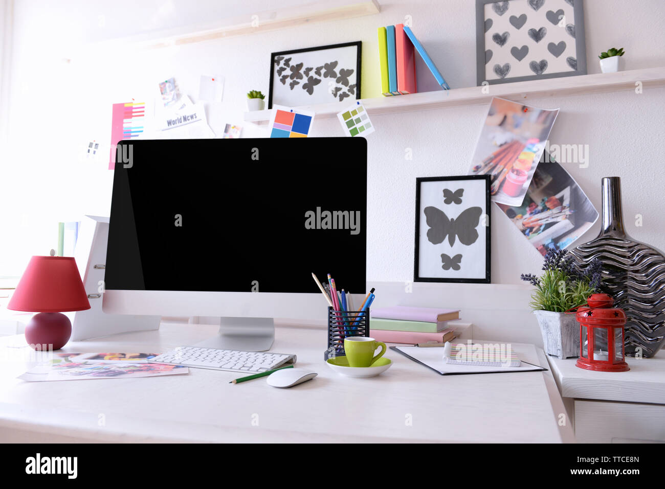 Modern computer on the table in decorated room Stock Photo - Alamy