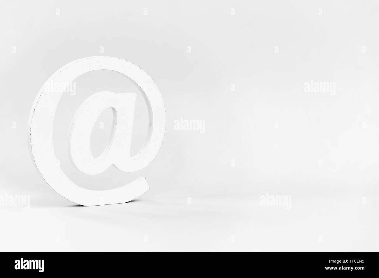 Email sign on blue background. Concept for email, communication or ...