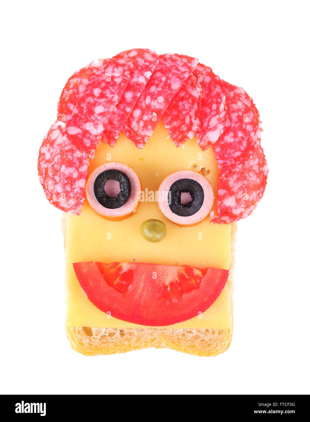Creative sandwich for a child with funny face isolated on white ...