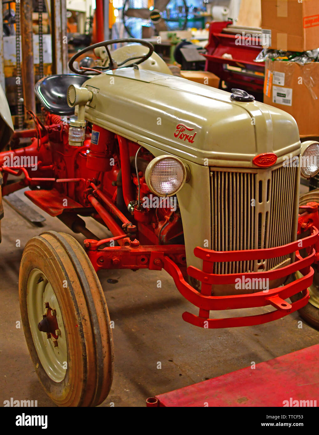 Vintage Ford tractor on display at a hardware store Stock Photo - Alamy
