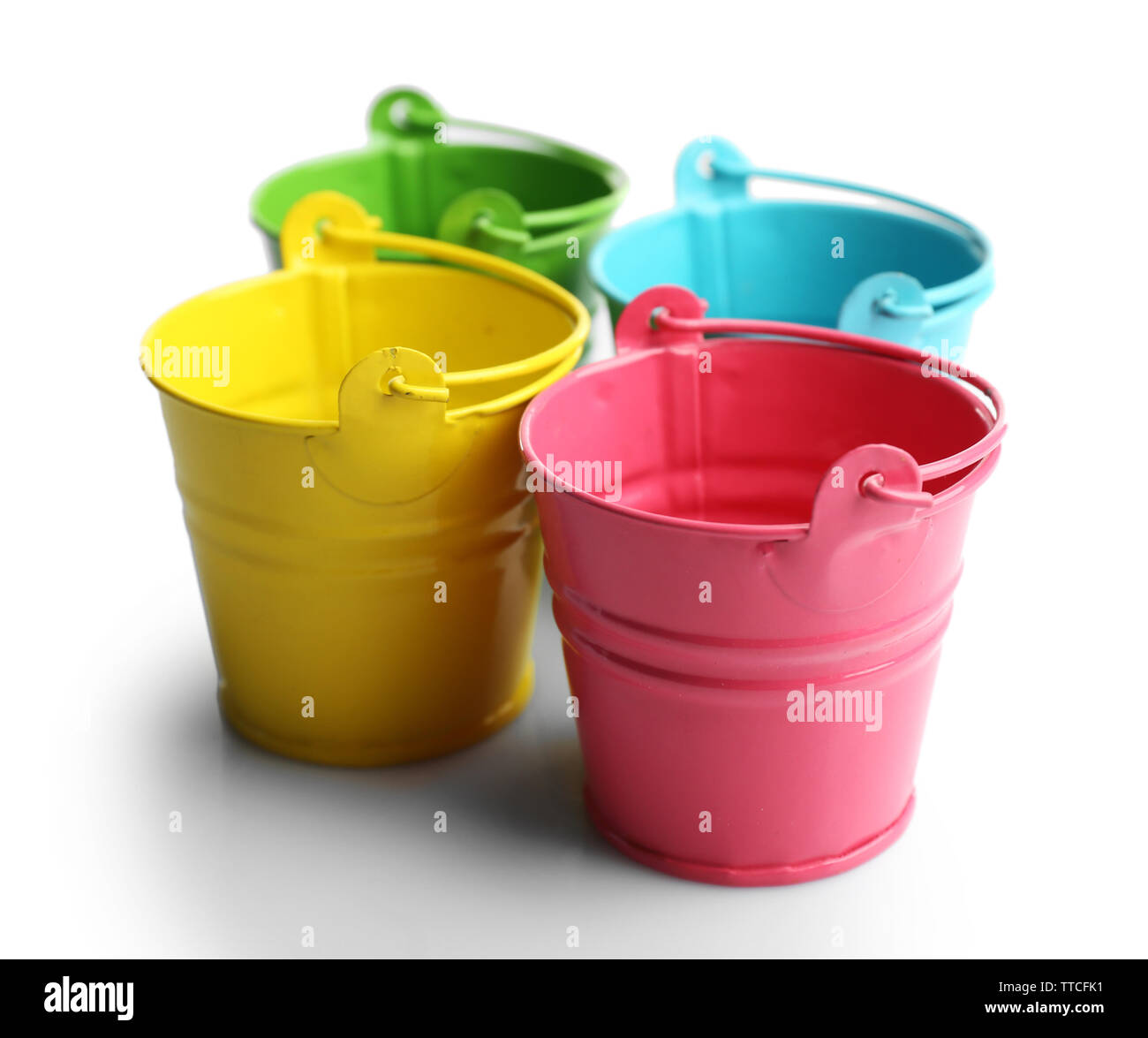 Four buckets of different colours, isolated on white Stock Photo - Alamy