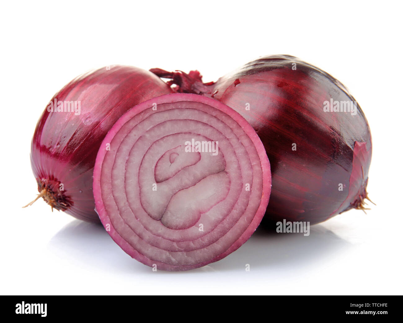 Whole and cut red onions isolated on white Stock Photo - Alamy