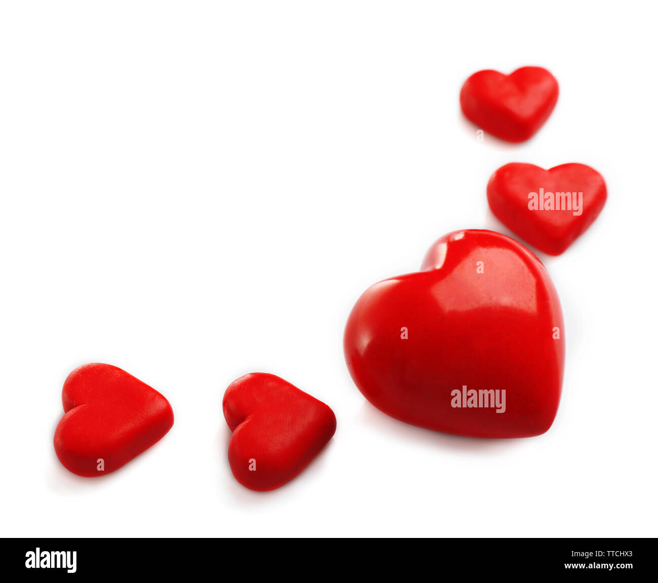 Five red hearts, isolated on white Stock Photo - Alamy