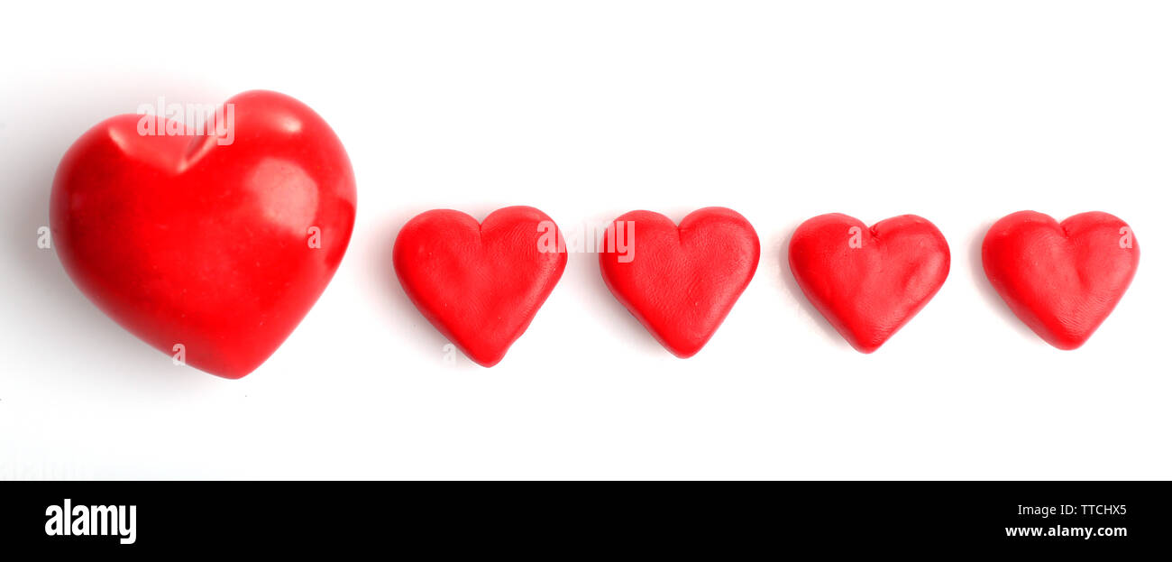 Five red hearts, isolated on white Stock Photo - Alamy
