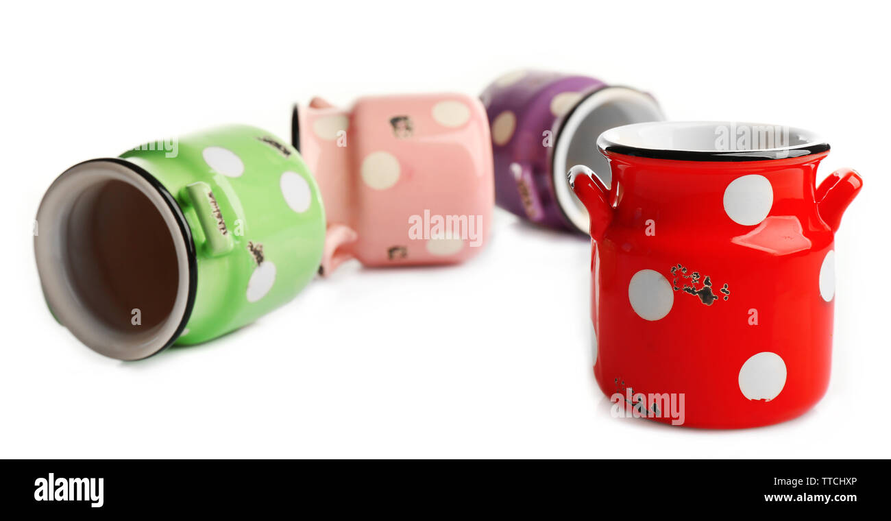 Old colourful milk cans with polka dots, isolated on white Stock Photo ...