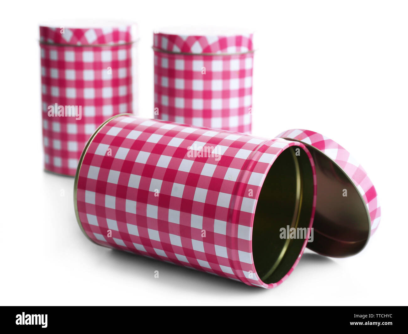 Three red and white checkered tin containers, isolated on white Stock ...