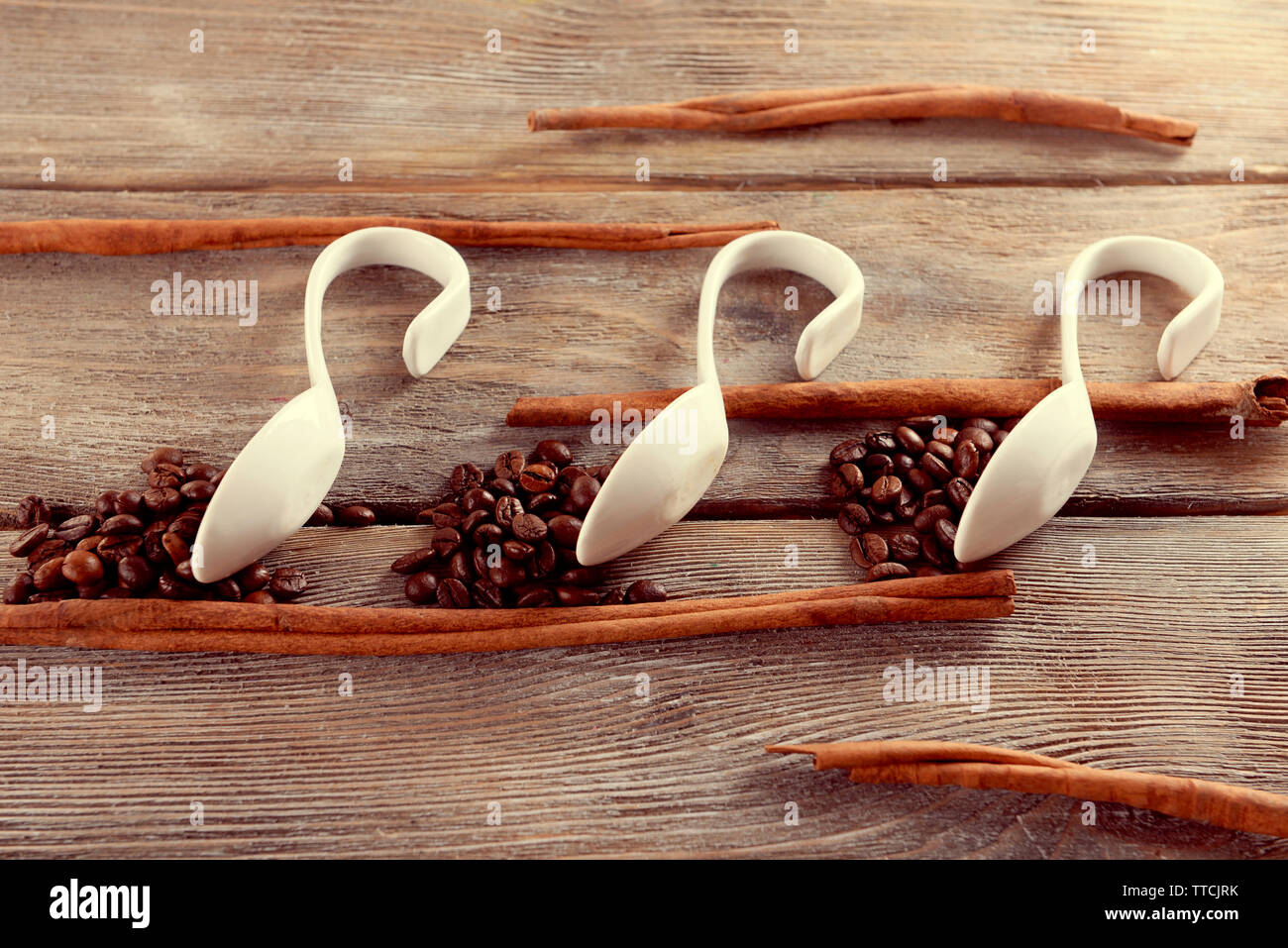 Creative musical notes made of saucer with roasted coffee beans on ...